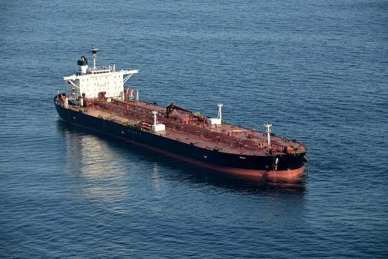 Russian ghost ship raided off France, arrests made