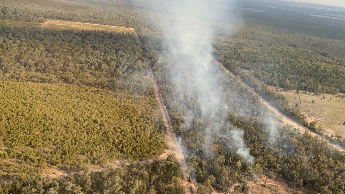 Man charged with lighting fires after start of fire bans in Queensland