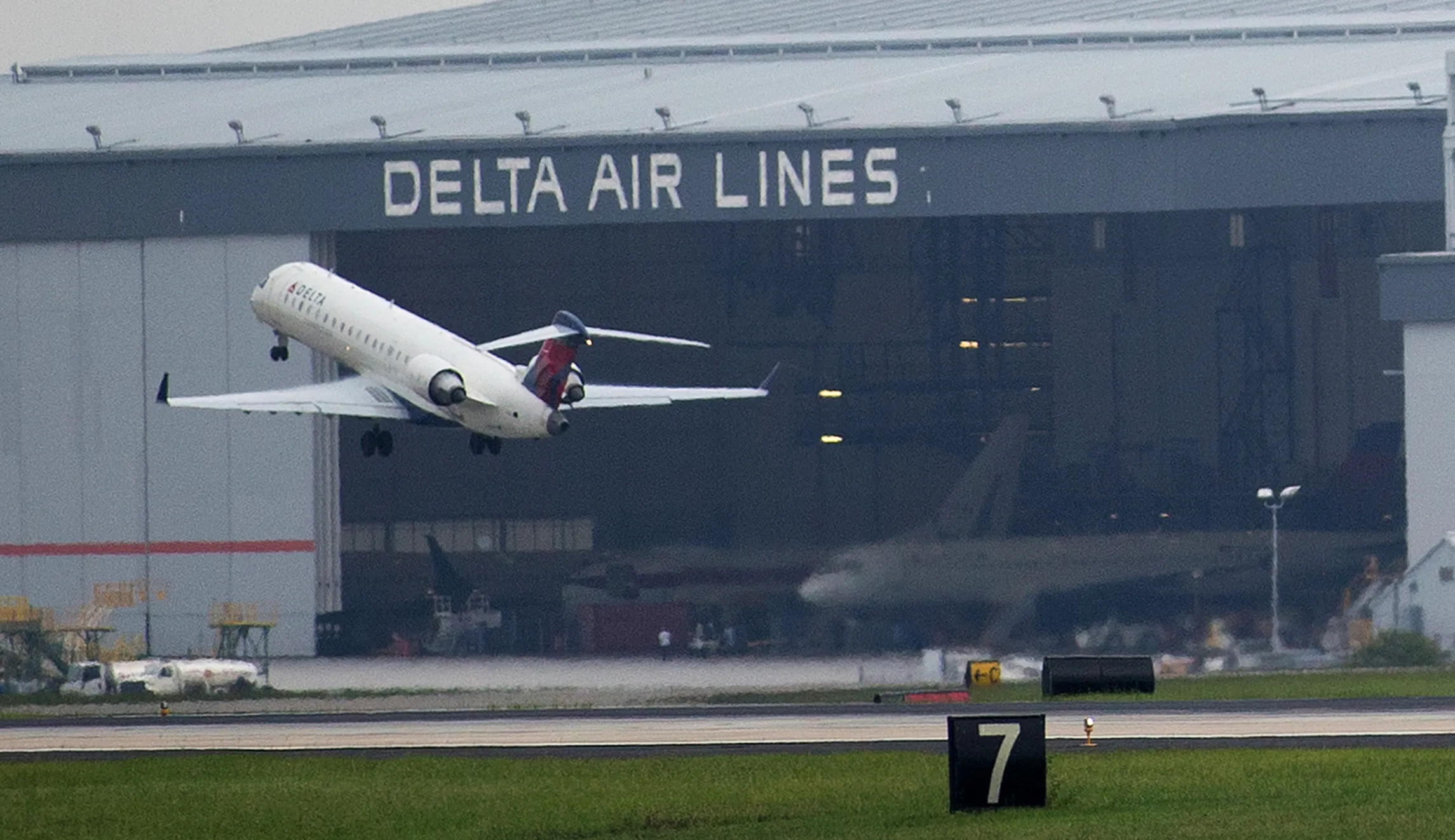 Wing detaches from aircraft as two planes collide on runway at ...