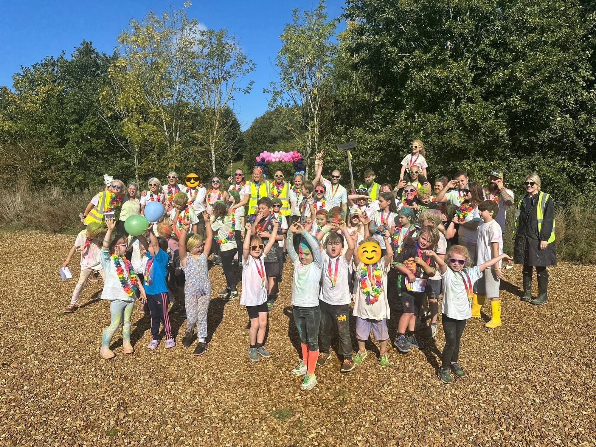 In pictures: More than 60 children and parents complete colour run to ...