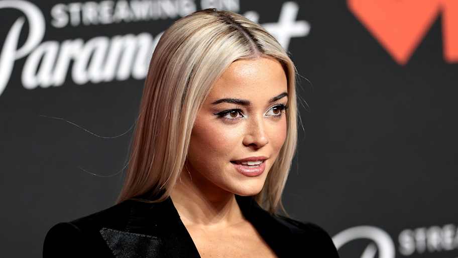 Olivia Dunne Brings the Heat in Fall-Forward Brown Leather Mini: Shop the $47 Dress