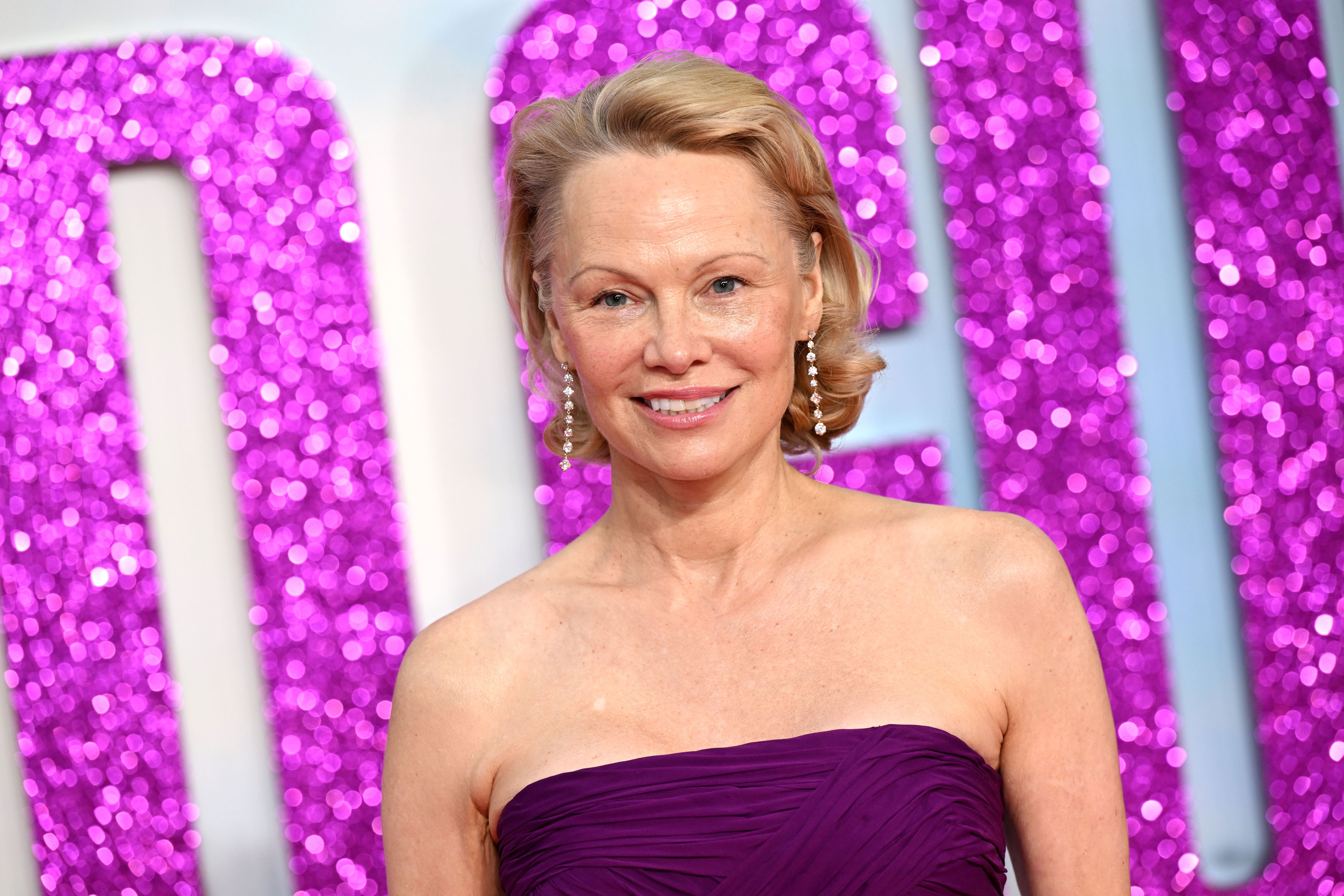 Pamela Anderson's Feathered '80s Haircut Was Inspired by French Cinema