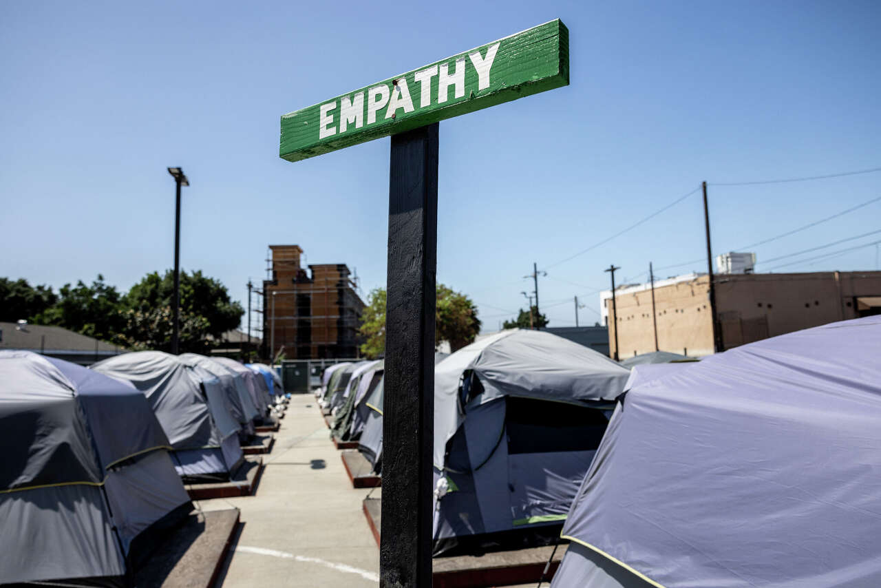 Hundreds let go from Texas homeless shelter, visa processing