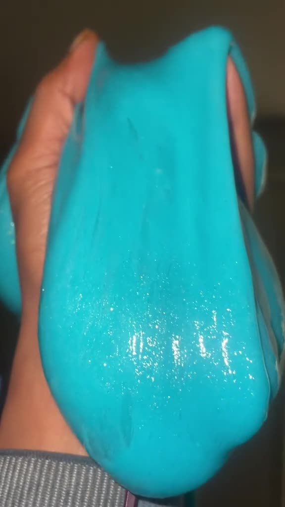Watch This Satisfying Blue Slime Stretch in My Hands