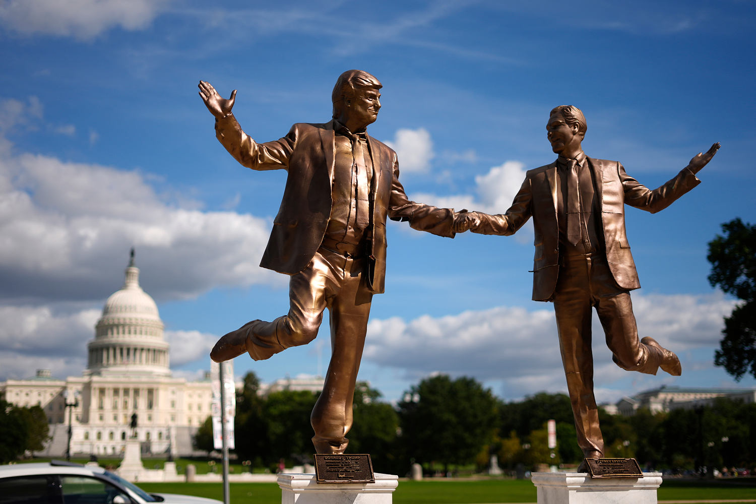 Statue of Trump and Epstein holding hands returns to the National Mall