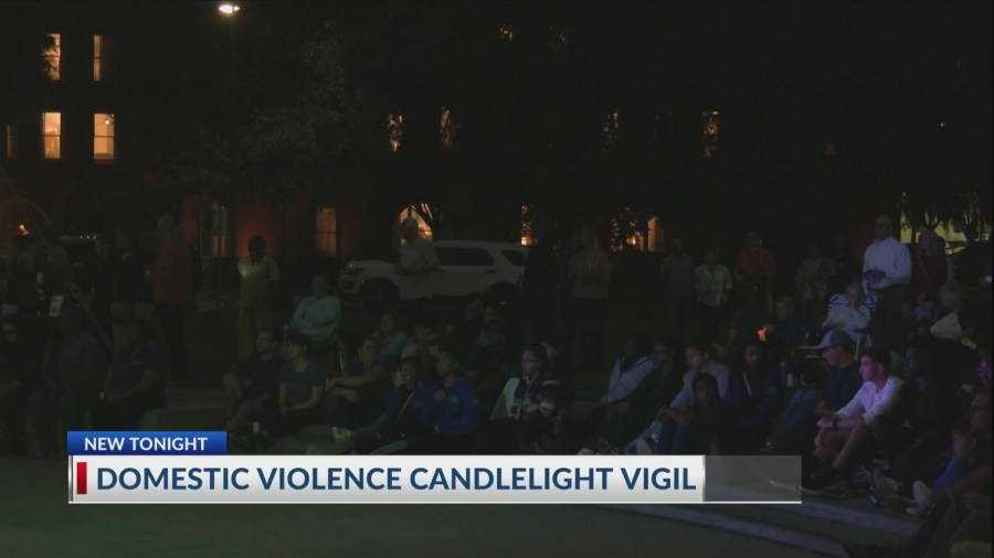 Hundreds attend candlelight vigil to raise awareness of domestic violence