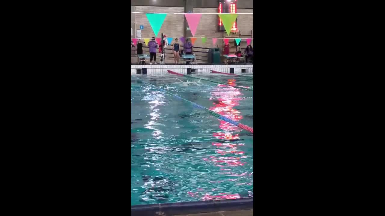 Woman slips on diving board before diving into pool in Mexico City, Mexico