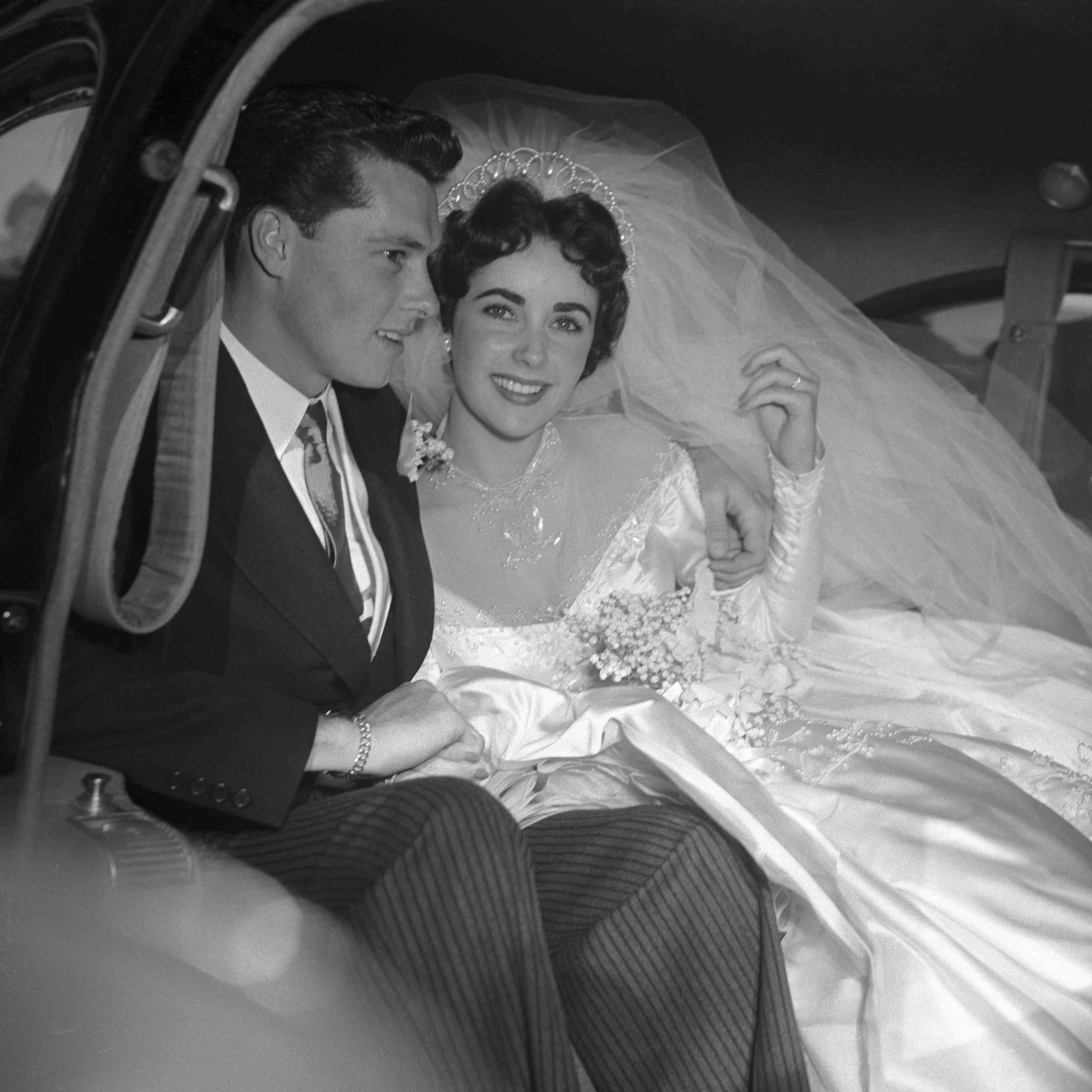 Elizabeth Taylor wore 8 different iconic wedding dresses down the aisle ...