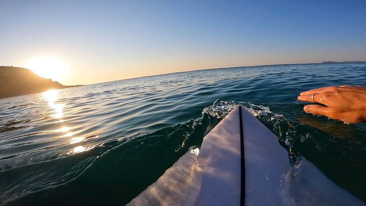 Surfing up the coast at beautiful locations