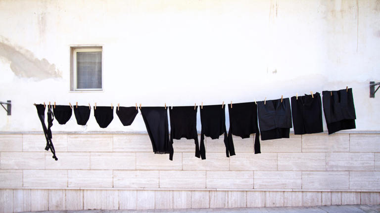 The Best Way To Wash Black Clothing So The Color Doesn't Fade