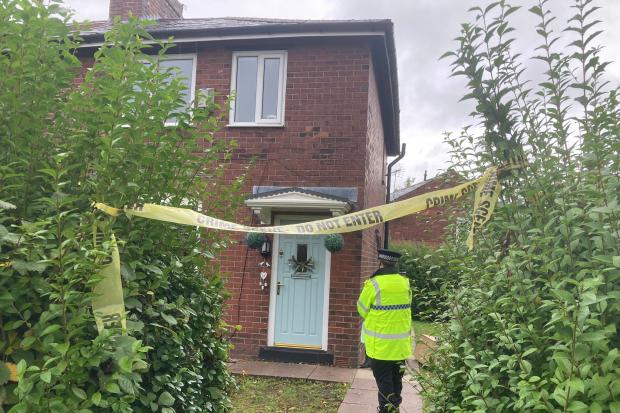 Concern as police tape off house with officers on scene throughout the day