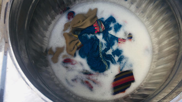 The Best Way To Wash Black Clothing So The Color Doesn't Fade