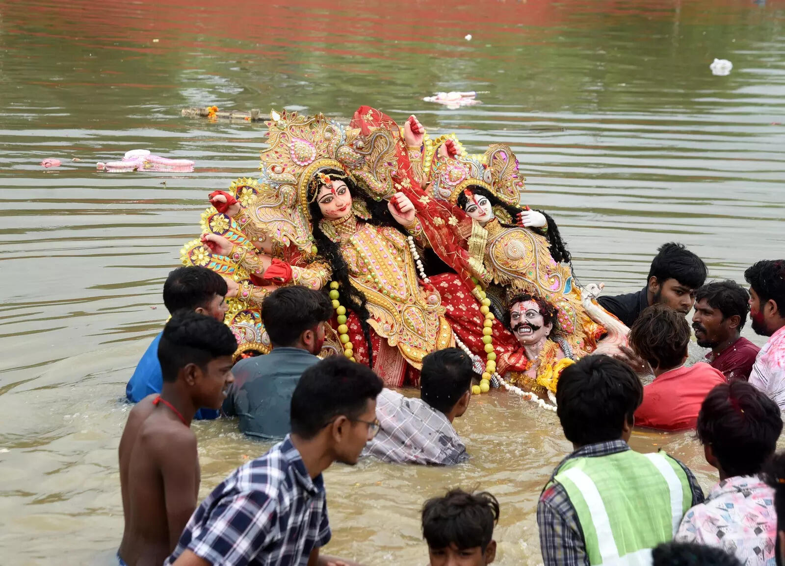 Durga idols immersed in artificial water bodies amid strict vigil