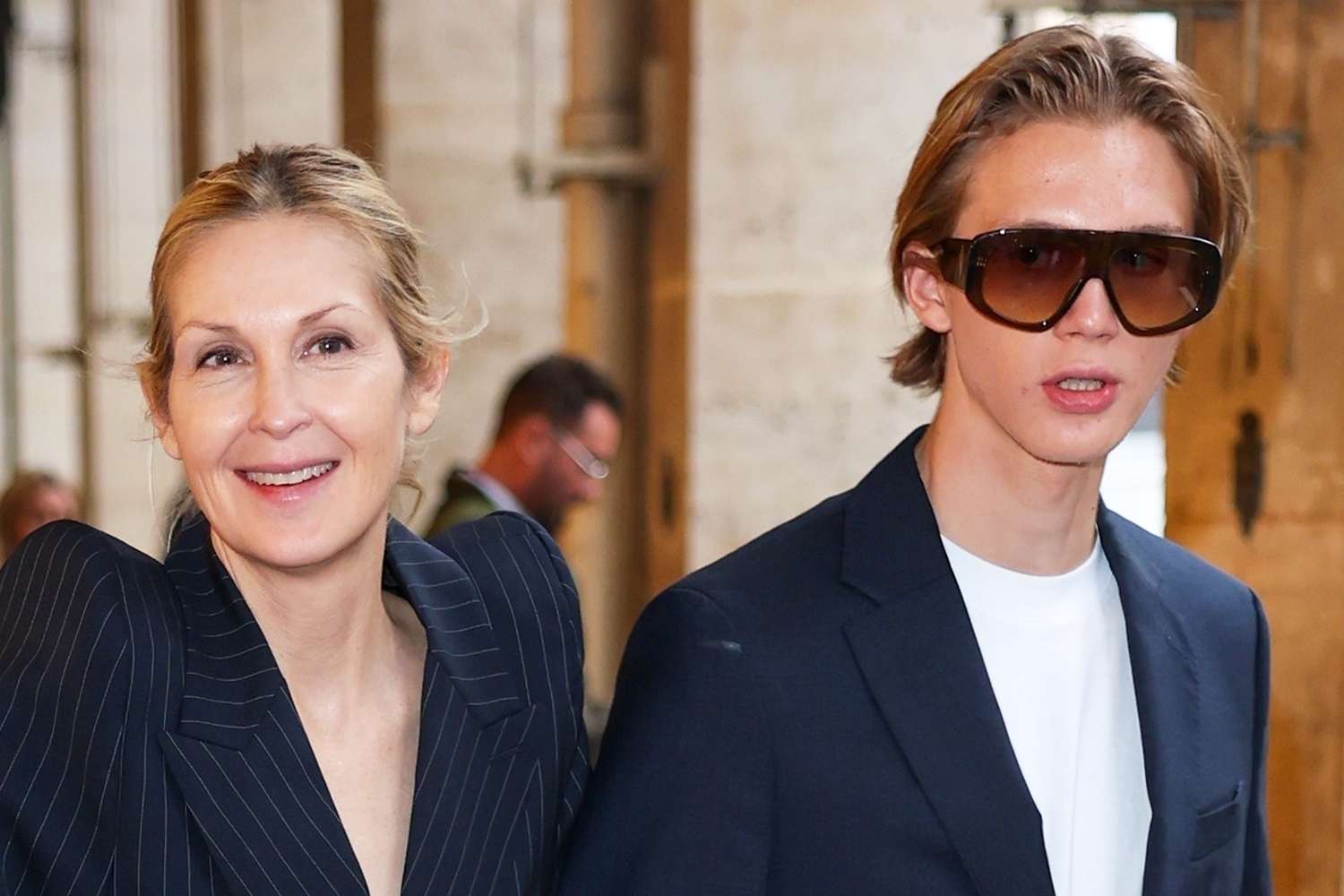Kelly Rutherford and Son Hermés, 18, Match in Navy Suit Jackets as They ...