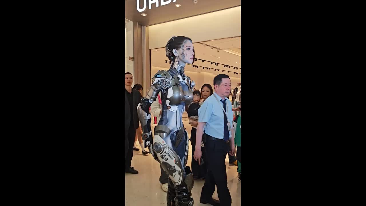 Woman dresses like a real robot at shopping mall in China