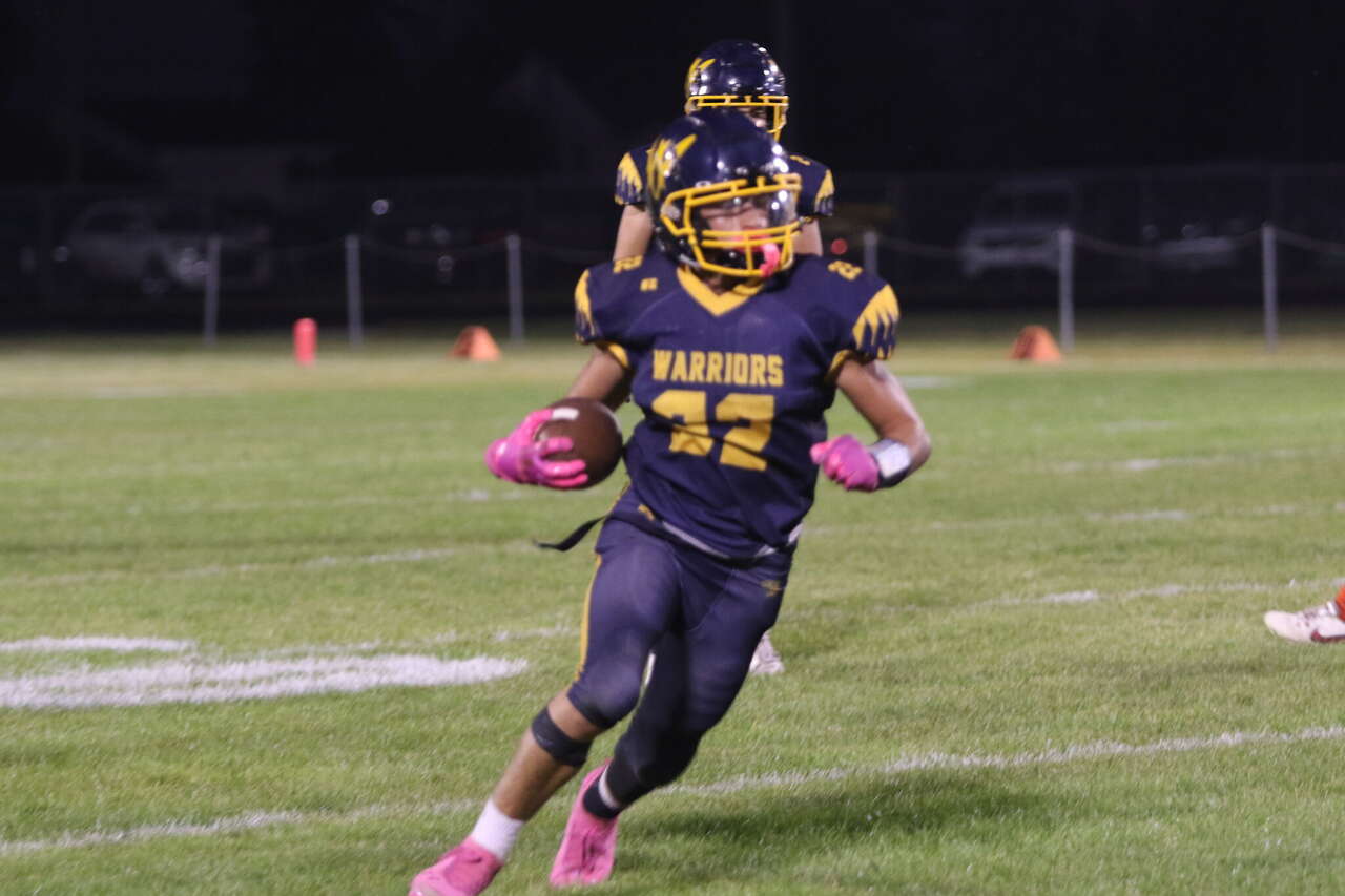 Stonecipher scores 4 TDs, North Huron holds on to defeat Peck