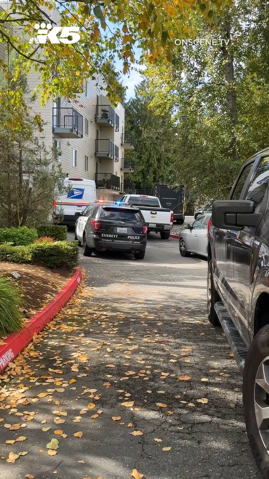 USPS worker shot by package delivery driver in Everett