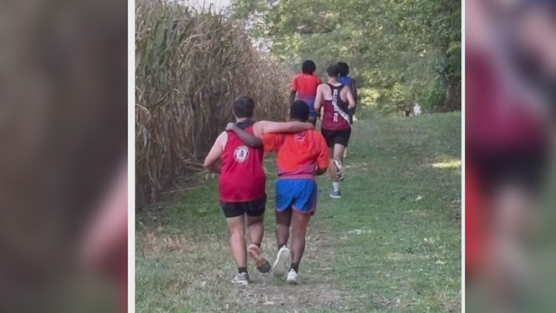 Rival cross country runners lean on each other to finish race