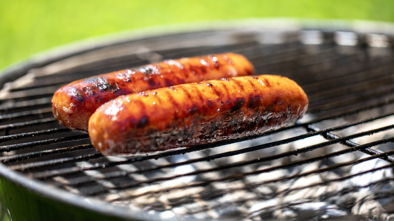 Avoid This Handling Mistake When Grilling Your Hot Dogs