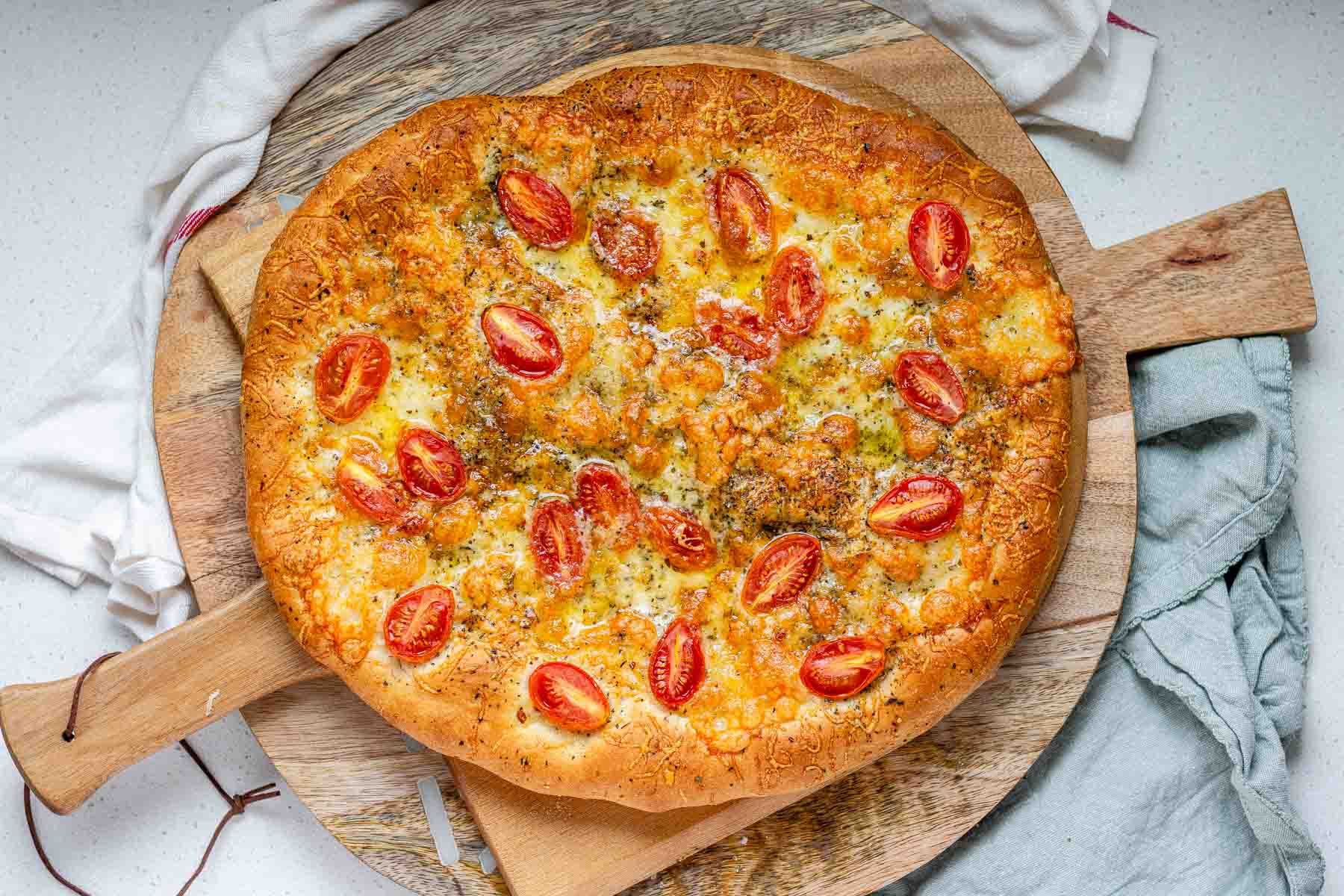 Kitchen Tools That Make Homemade Pizza Night So Much Easier