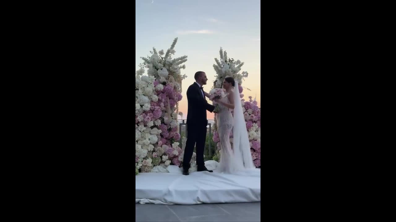 Newlyweds startled by fireworks during wedding kiss in Bodrum, Turkey