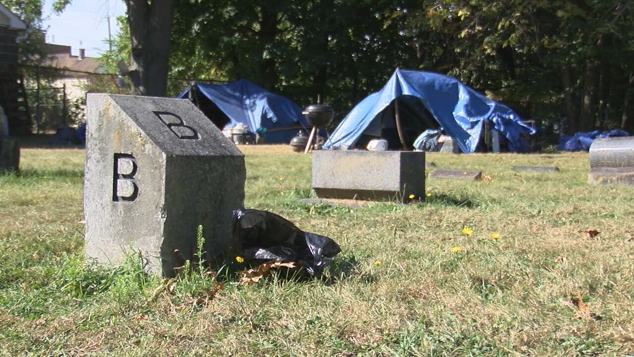 Homeless encampment in Cleveland’s Tremont neighborhood cemetery raises ...
