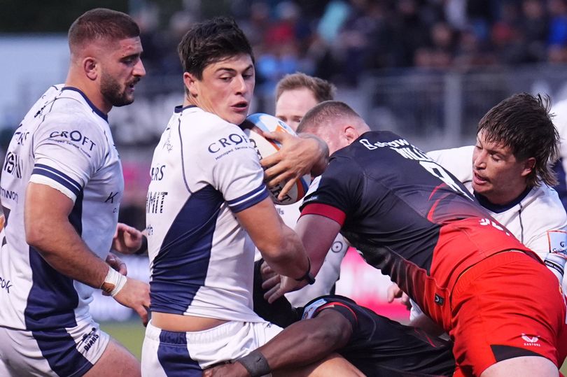 Louis Rees-Zammit injured as Wales star helped from field in worrying ...