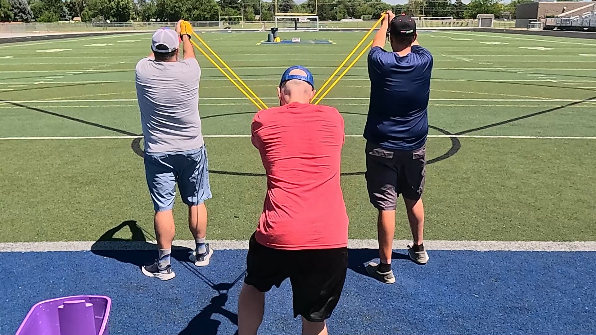 Three friends achieve record cornhole throw at Meridian High School in ...