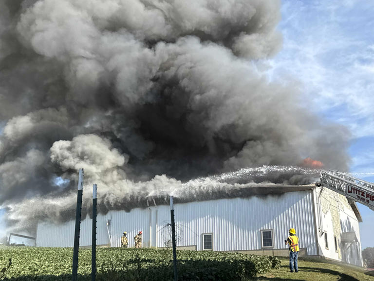Crews are fighting a barn fire in Lancaster County