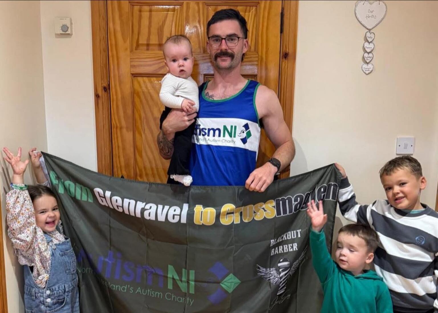 ‘Superhero’ dad runs 75 miles in 14 hours to raise funds for Autism NI