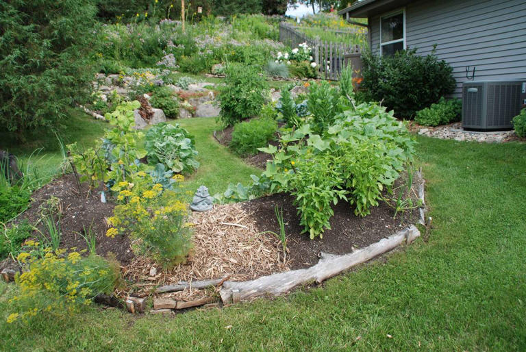 Improve garden soil with fall leaves and landscape trimmings