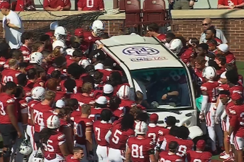 Oklahoma star stretchered off field after violent collision with brick wall