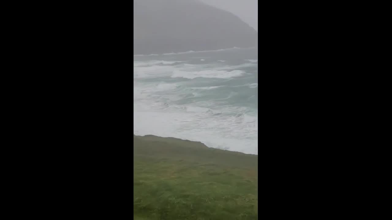 Stormy seas and strong winds at Coumeenoole Beach in Dingle, Ireland
