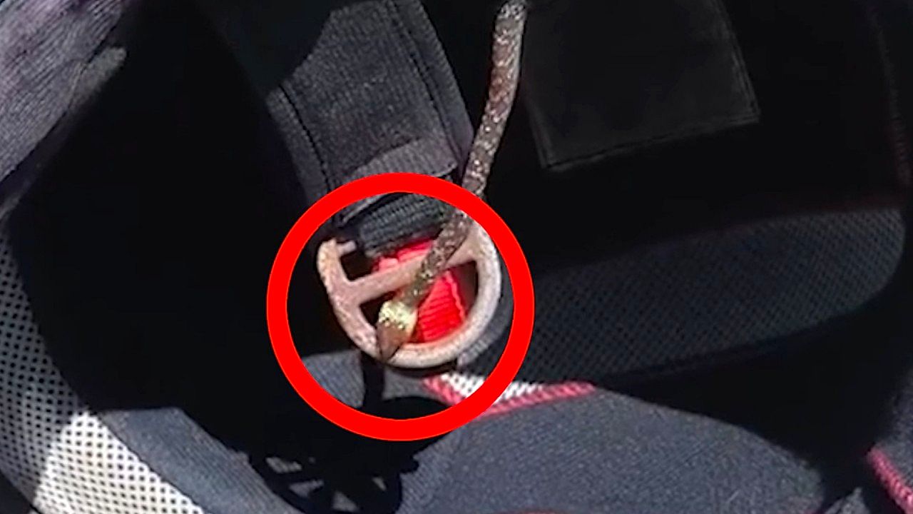 Terrifying moment snake slithers out of man's helmet after three-hour ride