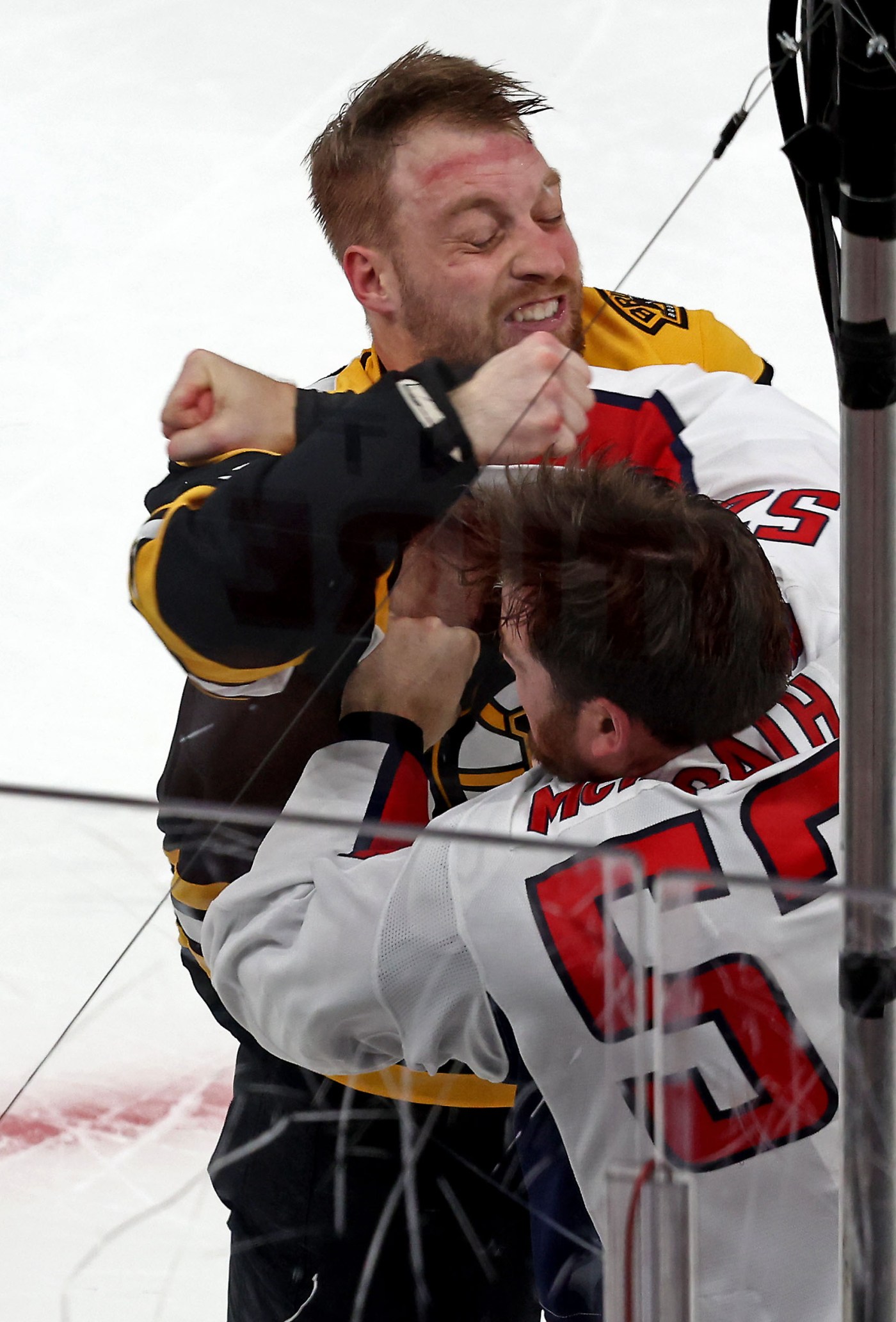 Bruins make cuts to set 23-man roster