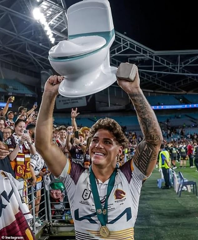 Broncos coach Michael Maguire drinks from a toilet as Reece Walsh joins ...