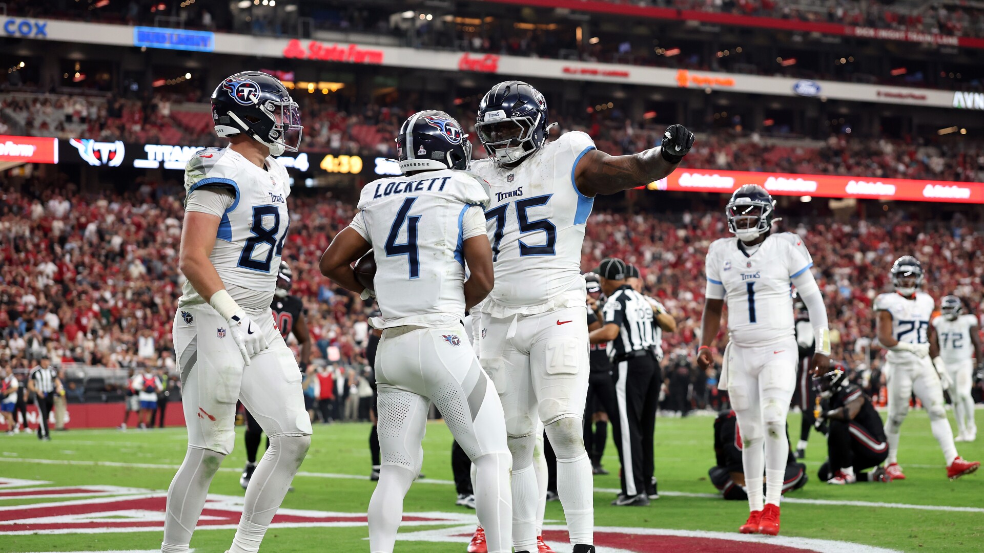 Titans pull off wild comeback for their first win of the season