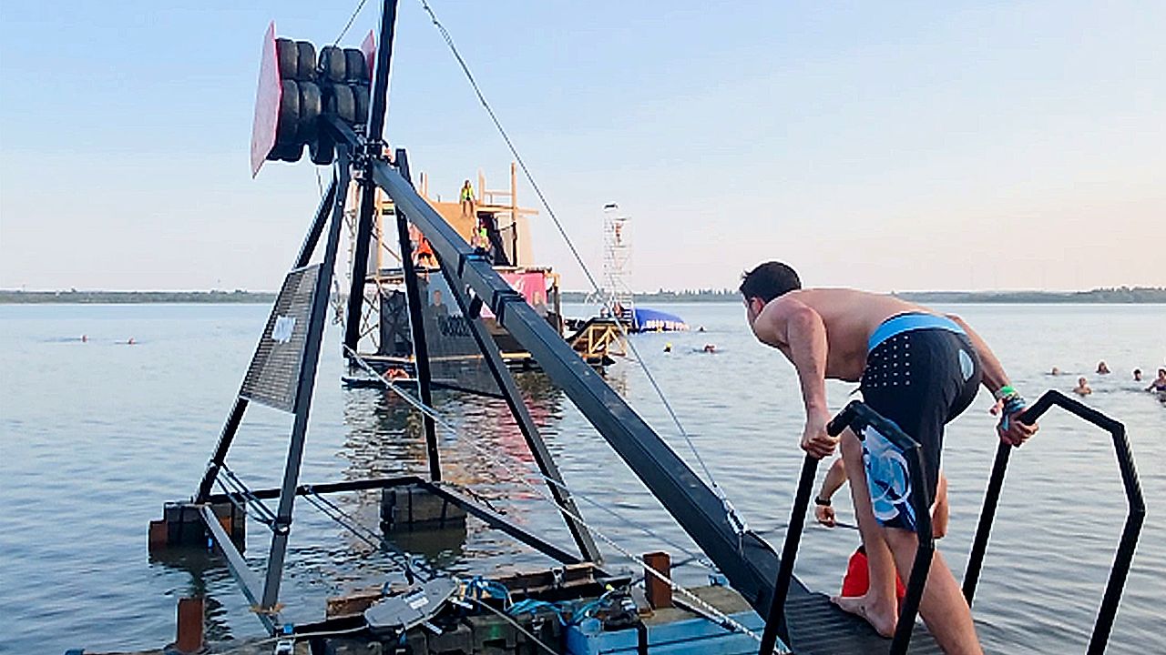 Engineering YouTubers create huge 'human catapult'