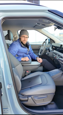 Sliding Console Table for Front Occupants in the Kia EV3