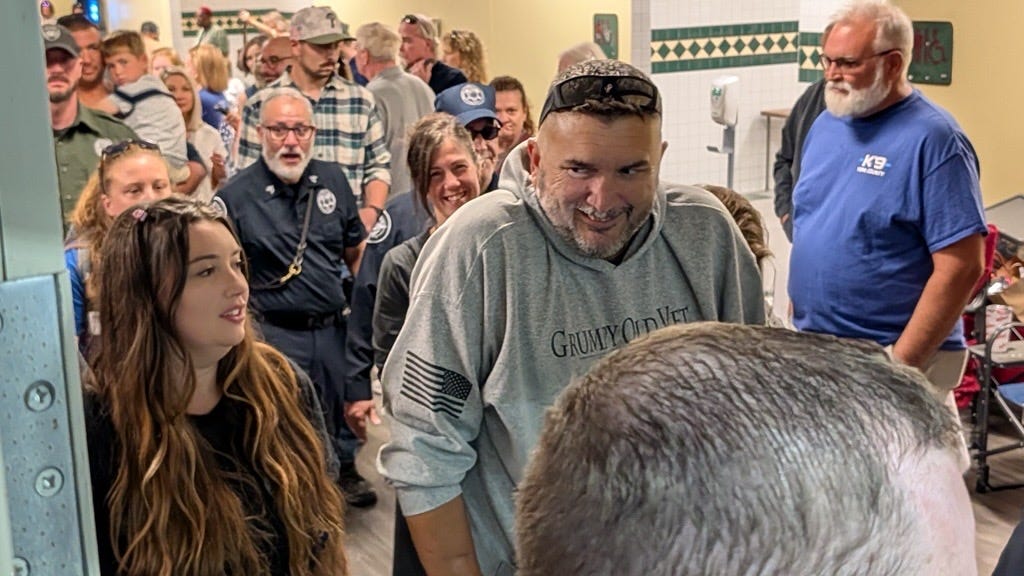 Wounded Lt. David Godfrey attends K-9 fundraiser days after release ...