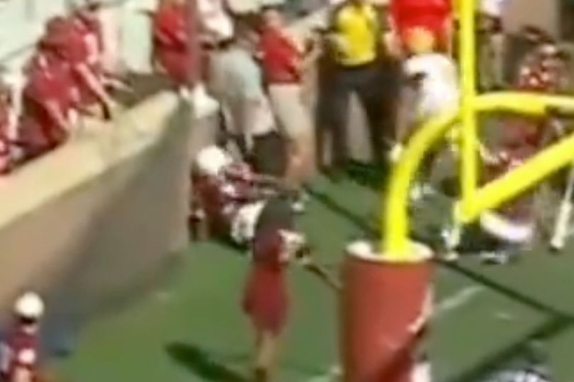 Football player suffers horror injury after crashing into brick wall as ...