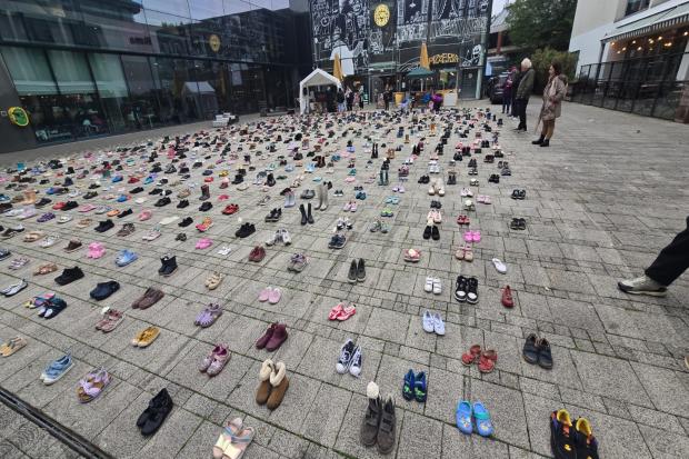 Hundreds of shoes form memorial for children killed in Gaza