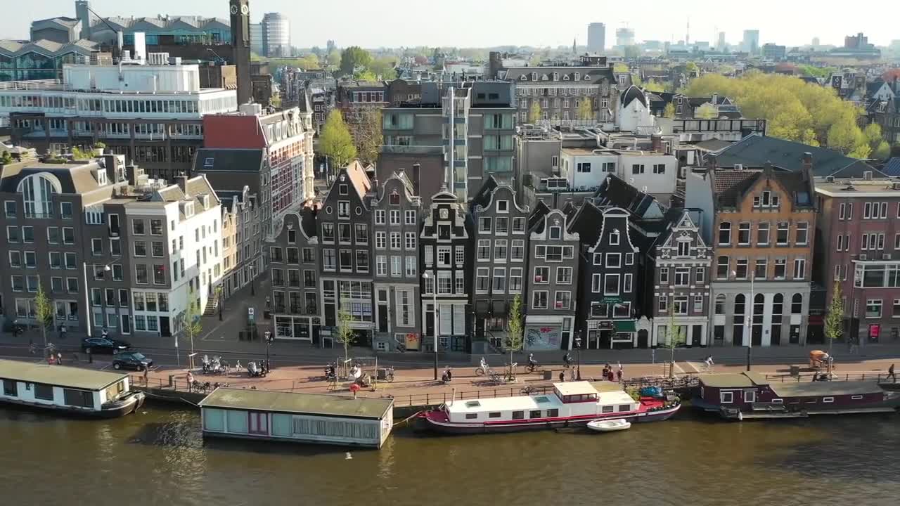Flying Through Amsterdam: Stunning Aerial Cityscapes...