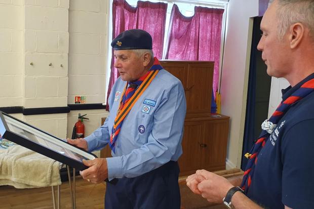 Scout leader who raised generations of kids steps down after 40 years