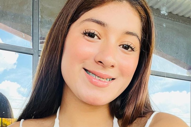 Young woman drinking in nightgown shot dead by several gunmen as she ...