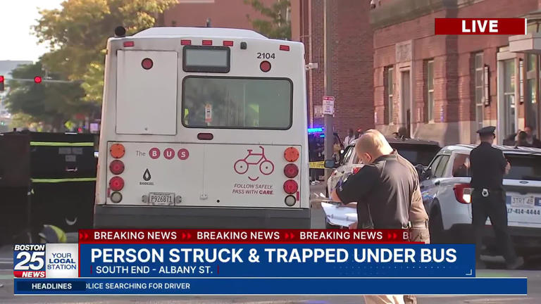Pedestrian struck, trapped under bus in Boston