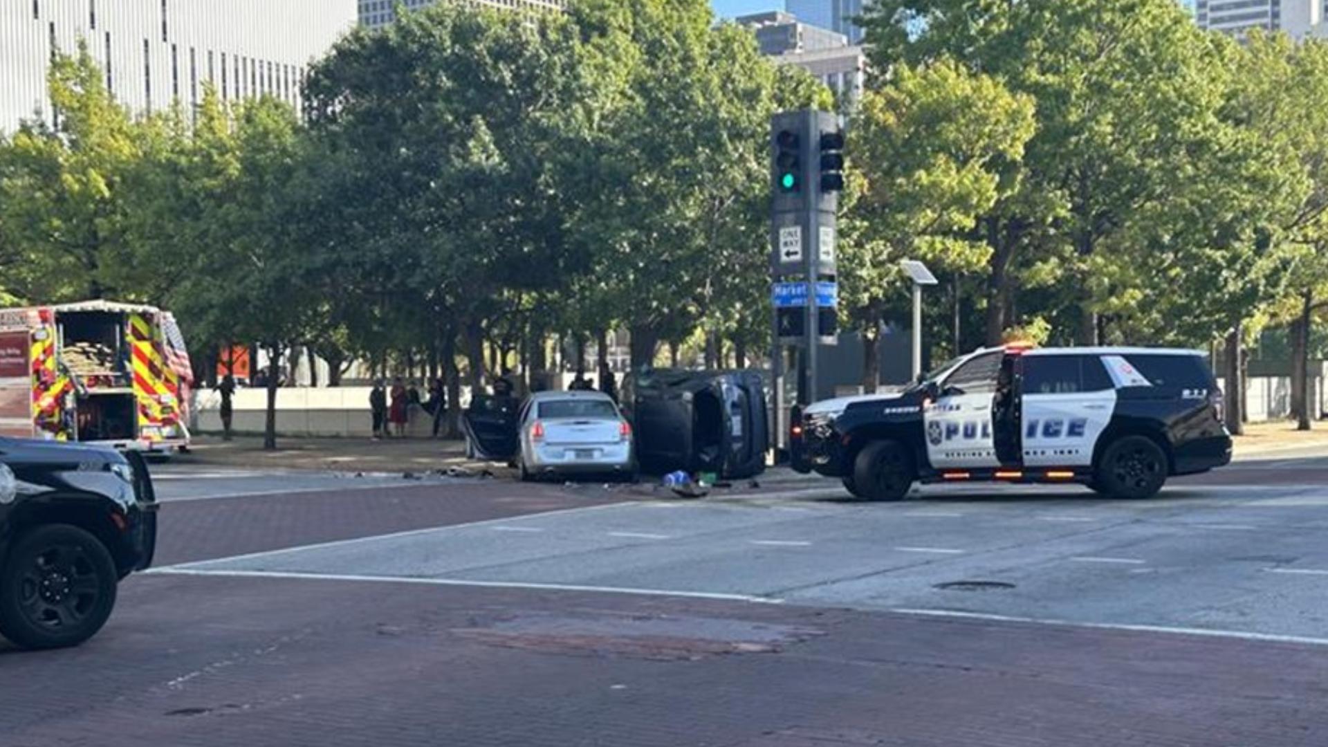 Vehicle flips on its side in two-car collision in Downtown Dallas