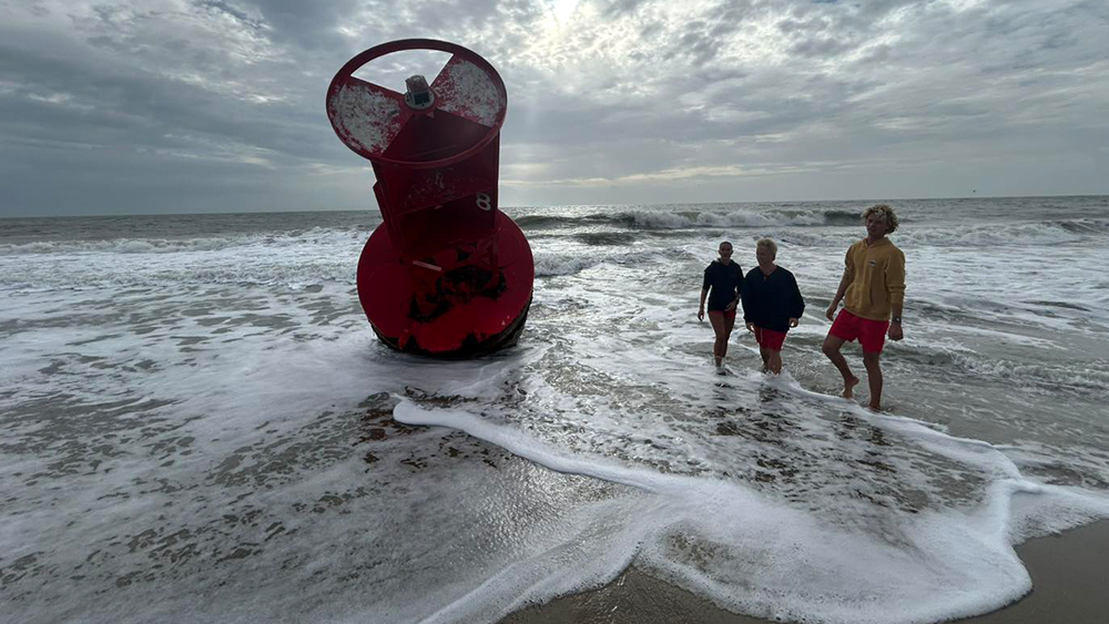 Massive buoy washes ashore on Tybee Island, prompting safety warnings ...