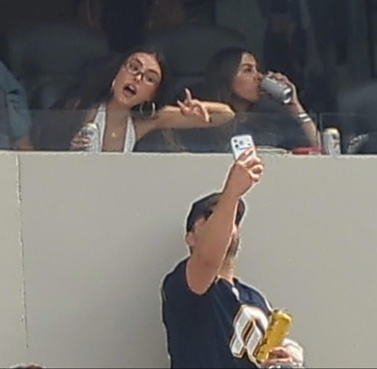 Justin Herbert and Madison Beer kiss publicly for first time before ...