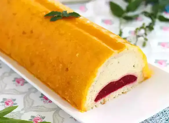 Mango and raspberry cake log